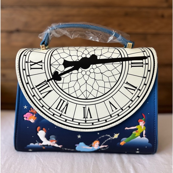 Loungefly | Bags | Disney Loungefly Peter Pan Crossbody Purse Glow In ...
